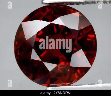 Brilliantly Cut Deep Red Ruby Sparkling Under Light Stock Photo - Alamy