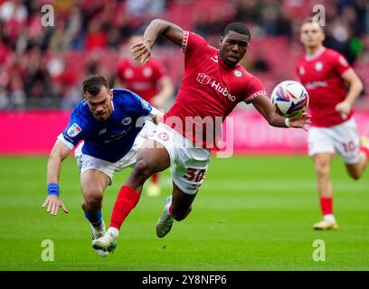Bristol City's Sinclair Armstrong (right) closes down Middlesbrough ...