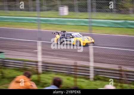 High-Speed Action at Monza Circuit: Dynamic Racing Car Captured in ...