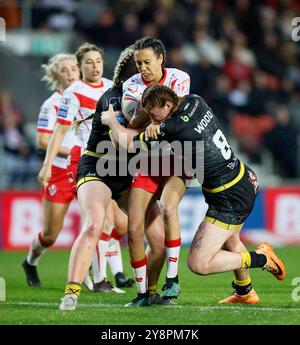 St Helens' Zoe Harris (centre) celebrates after the Betfred Women's ...