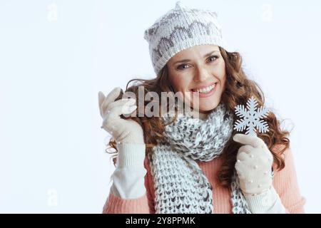Hello winter. Portrait of happy modern female in sweater, mittens, hat ...