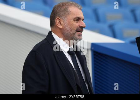 Tottenham Hotspur manager Ange Postecoglou (right) and assistant coach ...
