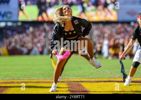 Washington Commanders cheerleaders perform during an NFL football game ...