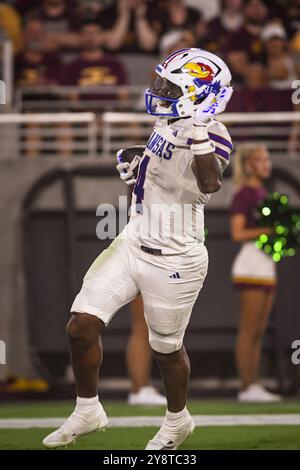 Kansas running back Devin Neal runs the 40-yard dash at the NFL ...