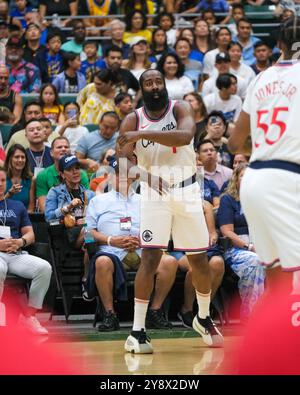 Los Angeles Clippers guard James Harden (1) confers with referee Josh ...
