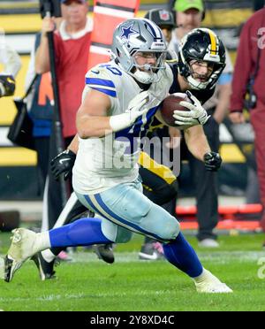 Dallas Cowboys running back Hunter Luepke (40) on a catch and run ...