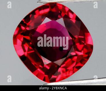 Radiant Red Gemstone Captured in Sparkling Precision Stock Photo - Alamy