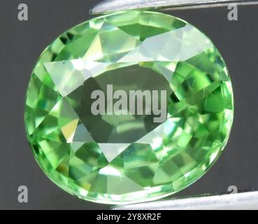 Radiant Green Gemstone Sparkling Under Soft Light Stock Photo - Alamy