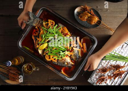 chong qing House Roast Fish with Mashed Garlic Stock Photo - Alamy