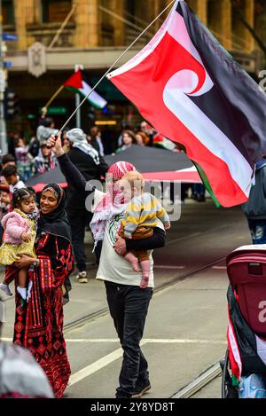 People are seen at State Library Station in Melbourne, Monday, December ...