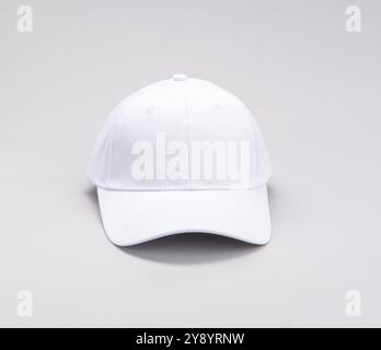 Blank white baseball cap on top of an urban backpack . Template Mock up ...