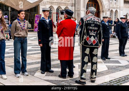 A Chelsea Pensioner Inspects A Group of Cub Scouts At The Pearly Kings ...
