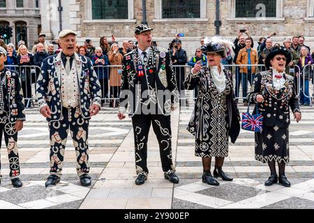 A Group of Pearlies Singing Traditional Songs At The Annual Pearly ...