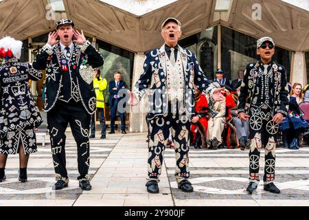 A Group of Pearly Kings and Queens Singing and Dancing To Traditional ...