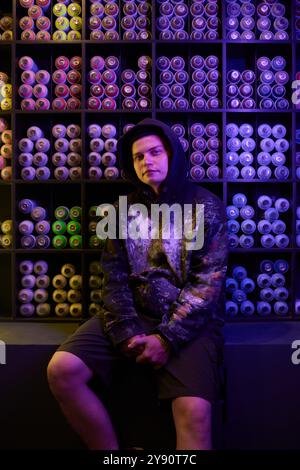 stylish guy sitting in a large comfortable armchair Stock Photo - Alamy