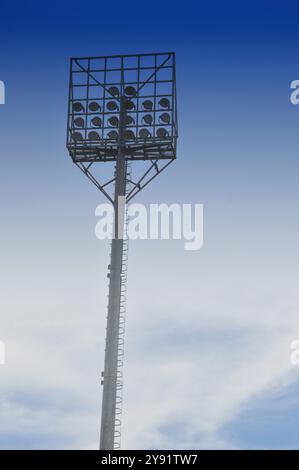 stadium light poles with white clouds and blue sky backgrounds Stock ...
