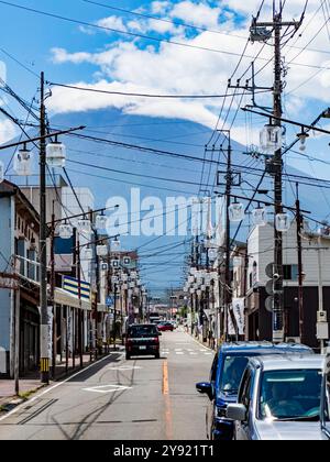 Cityscape of Shimoyoshida city and Mt. Fuji on autumn in japan, cloudy ...