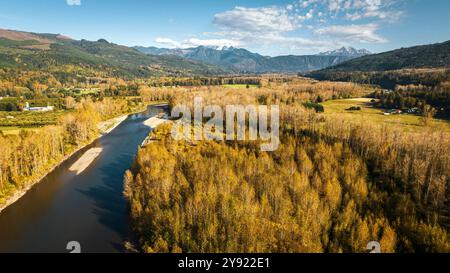 Aerial drone view along the Nooksack River at the foothills of the ...