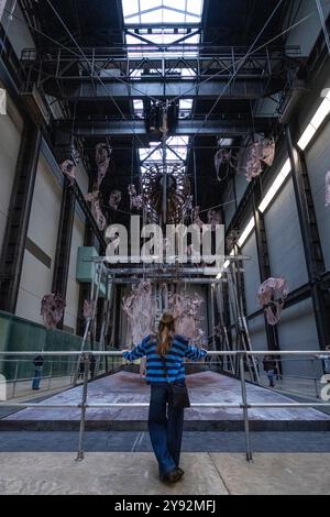 Open Wound with fabric hanging sculptures and mechanical installations ...