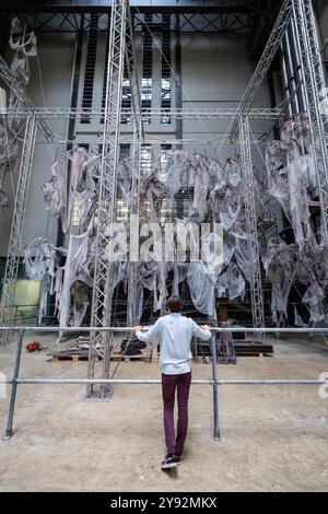 Open Wound with fabric hanging sculptures and mechanical installations ...