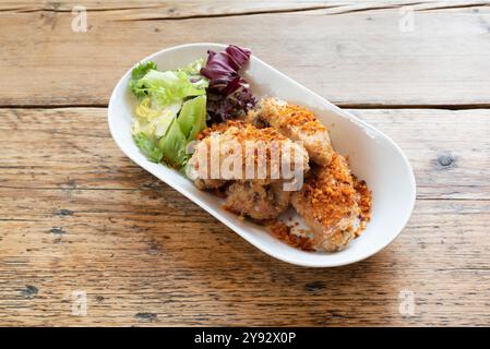 Salt and chilli seasoned chicken wings starter or side plate Stock ...