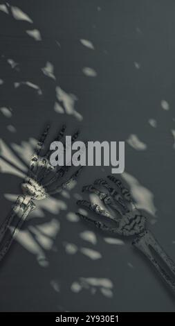 Zombie hand reaching out to human skull head on the tombstone. Hand ...