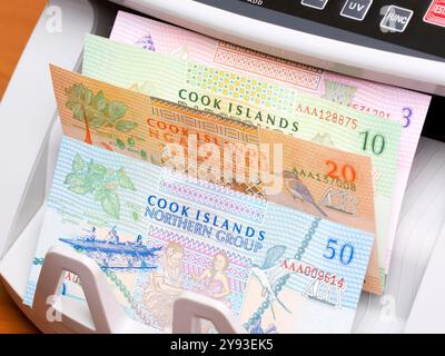 Cook Islands money - dollar in the counting machine Stock Photo - Alamy