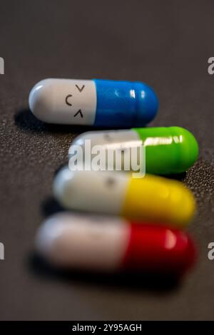 Tiny pills smiling with faces Stock Photo - Alamy