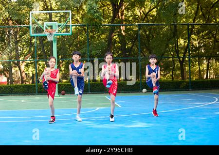 Kids Warming Up During Basketball Training Class Stock Photo - Alamy