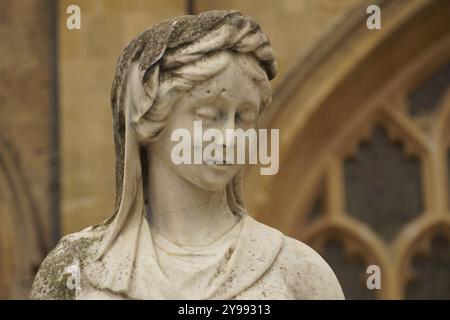Face of weathered angel statue Stock Photo - Alamy