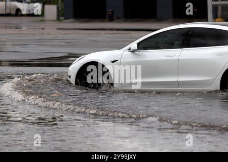 After heavy rains, traffic jams formed on roads, cars are doused with ...