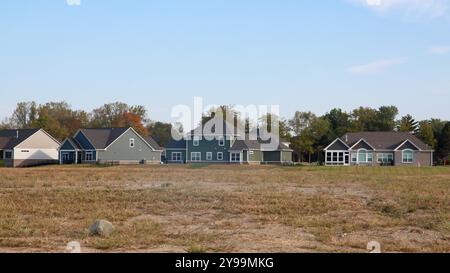 A home building boom leads to new home construction in the suburbs in ...