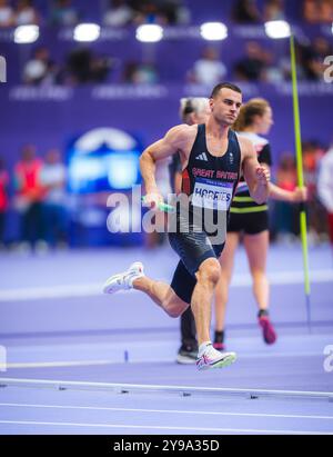 Toby Harries participating in the 4X400 meters relay at the Paris 2024 ...