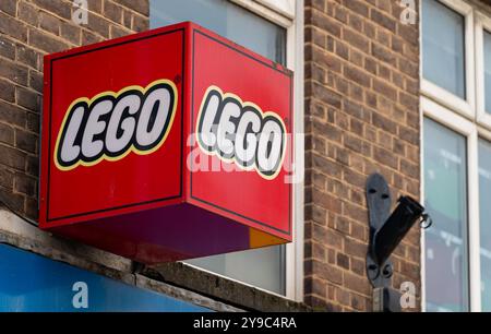 The logo of the kids toys company Lego is seen on top of store entrance ...