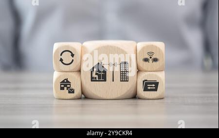 Wooden blocks with symbol of teleworking concept Stock Photo - Alamy
