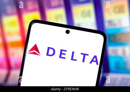 In this photo illustration a Delta Air Lines logo seen displayed on a ...