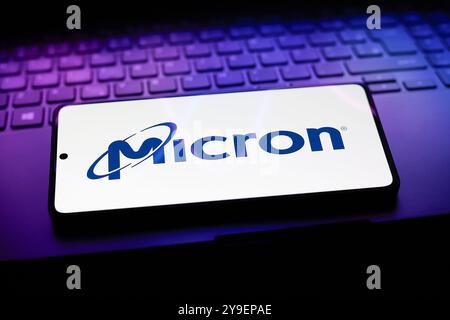 In this photo illustration, a Micron Technology logo seen displayed on ...