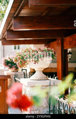 Wrought Iron Fence and Striped Wooden boards are varnished. Retro aged ...