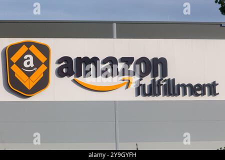 A logo sign outside of a Amazon Fulfillment center in San Marcos, Texas ...
