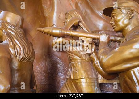A bronze statue of people involved in the communist revolution for ...