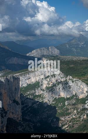 Verdant Cliffs and Caves of Verdon Gorge in France, with sunlight ...