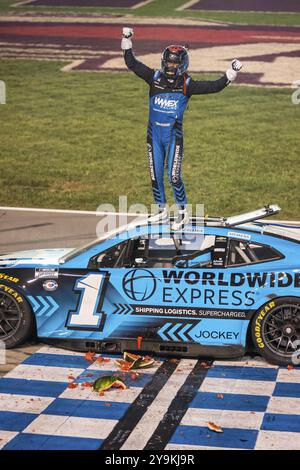 Ross Chastain celebrates in Victory Lane after winning a NASCAR Cup ...