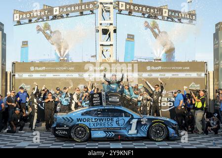 Ross Chastain celebrates in Victory Lane after winning a NASCAR Cup ...