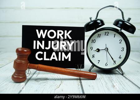 Work injury claim text on grunge background Stock Photo - Alamy