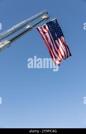 Scenic United States Flag hanging from a tree during fall colors in ...