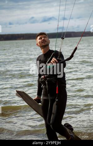 Wind Foil Surfer surf in the sea, close up Stock Photo - Alamy