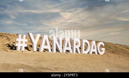 Sign for Yanardag (Burning Mountain) natural gas fire in Baku ...
