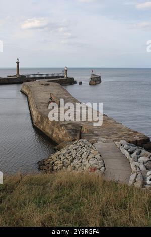 Whitby Pier, England, complete with lighthouses Stock Photo - Alamy