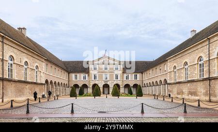 Beaune, France - April 29, 2024: City hall and square of ancient town ...