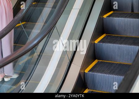 Close-Up View of an Escalator with Yellow Safety Markings Stock Photo ...